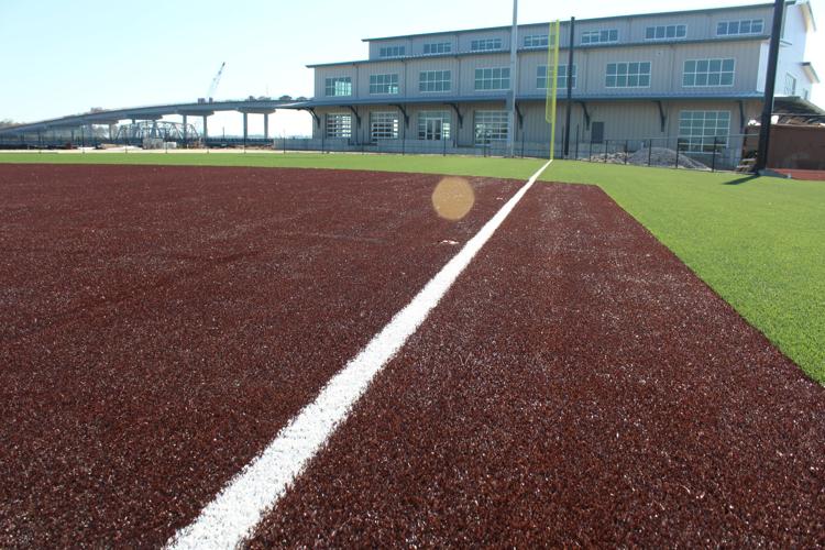 Laying down the turf - Shipyard Park's first field complete | News ...