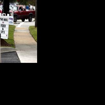 City eases stance on signs