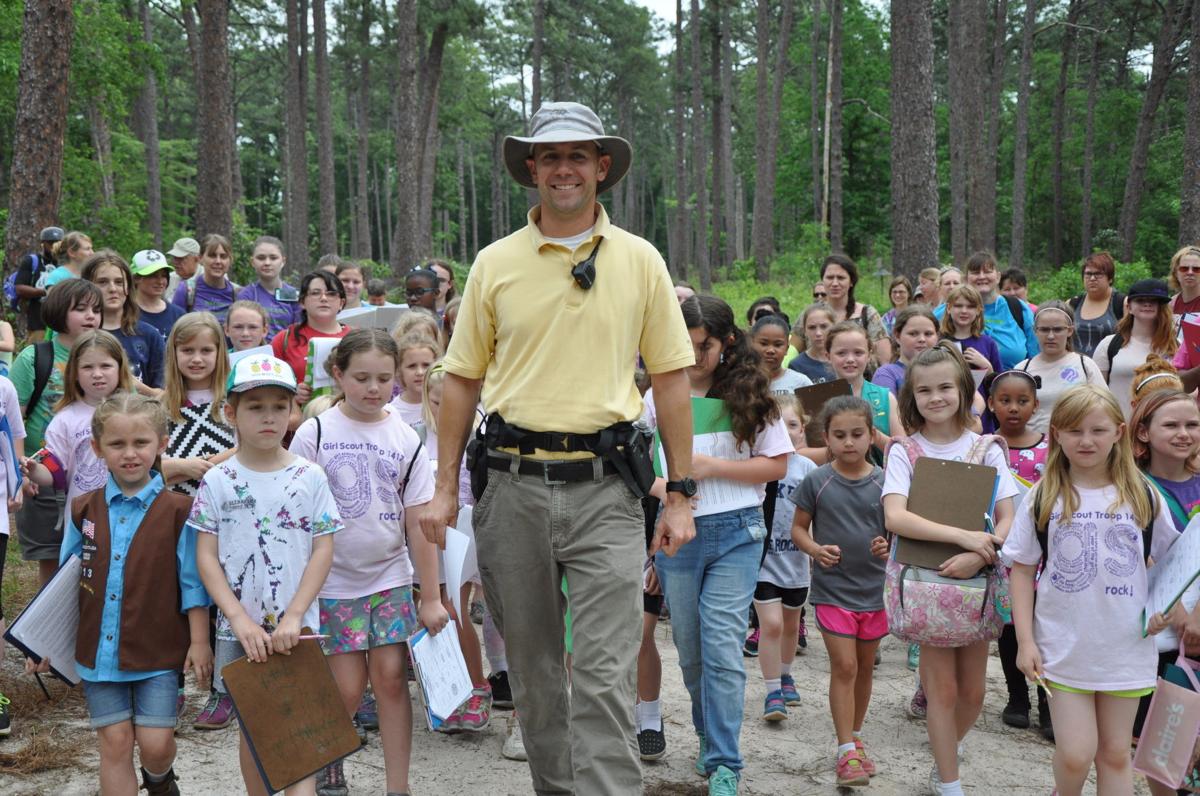 Girl Scouts work on becoming Young Conservationists in Hitchcock Woods ...