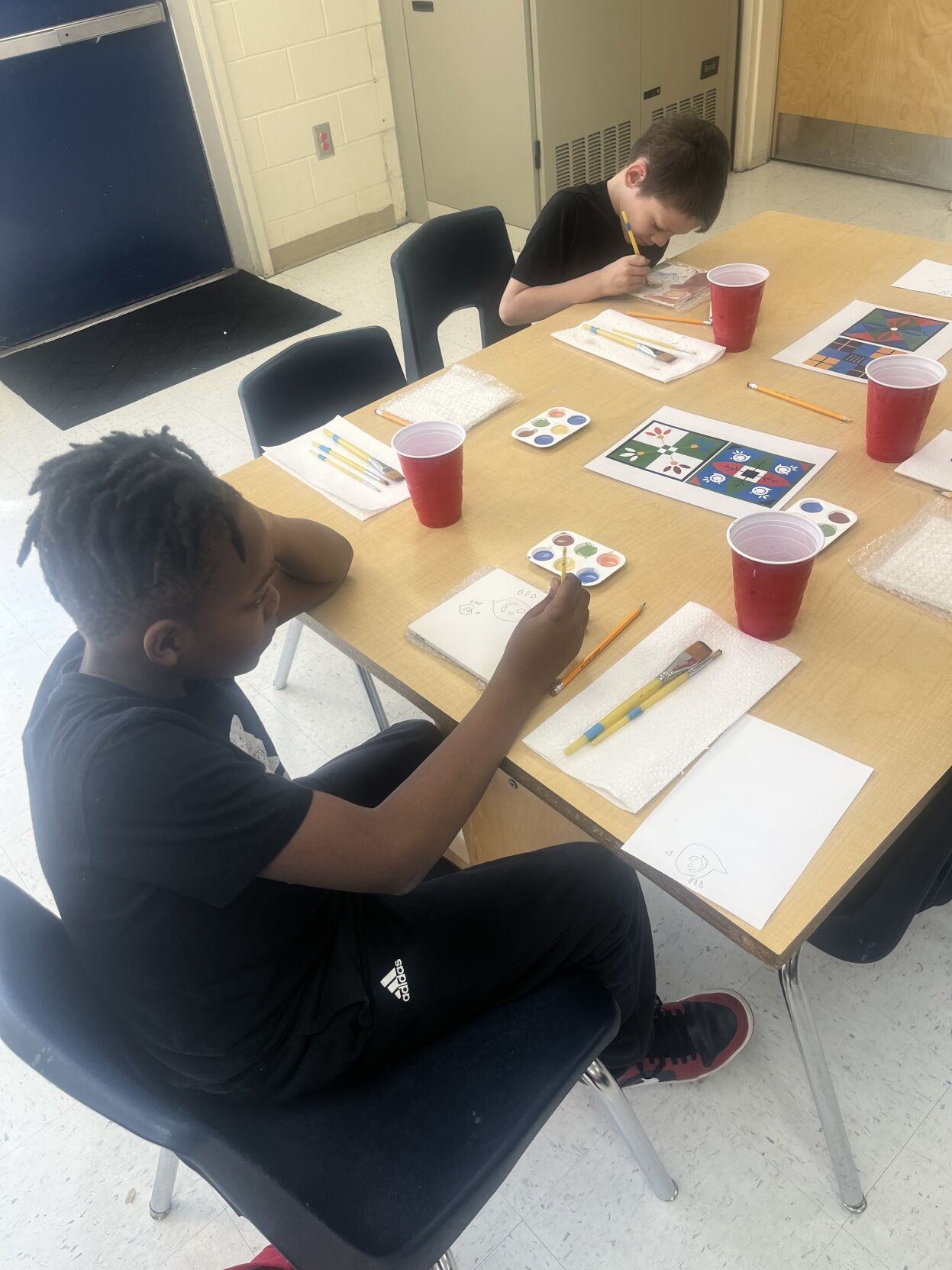 Kj’s IGA showcases painted tiles from WCSD scholars