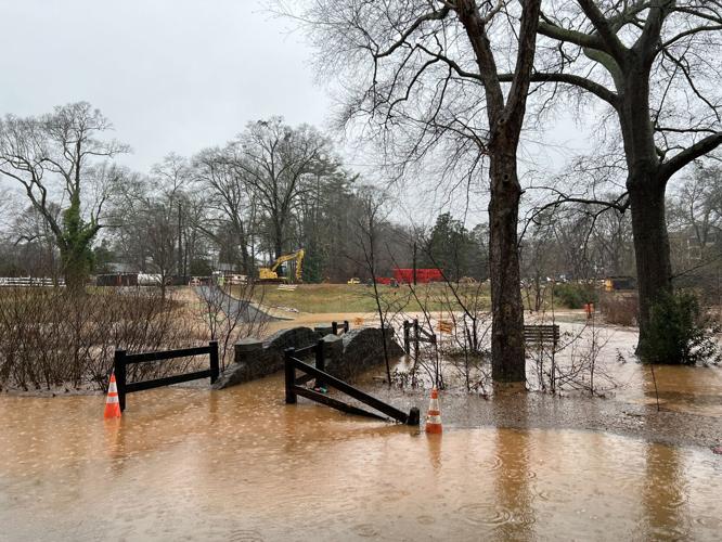 Greenville firefighters rescue people as floods close roads, parks