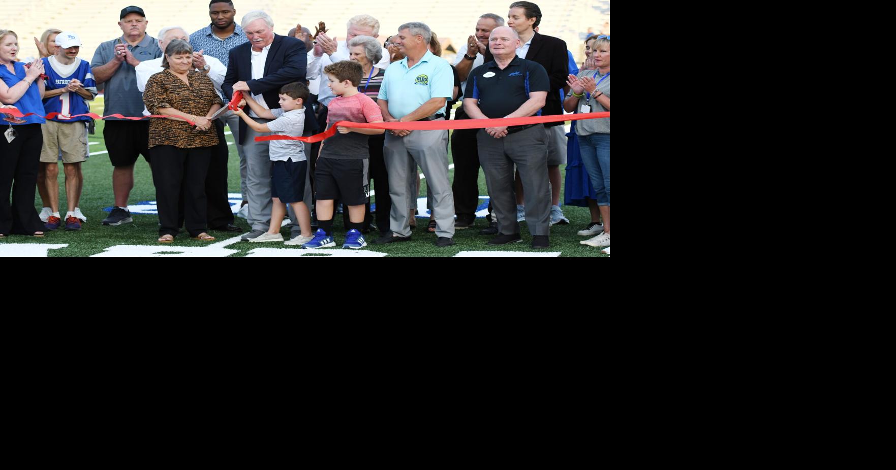 Officials cut the ribbon for LaPrad Field