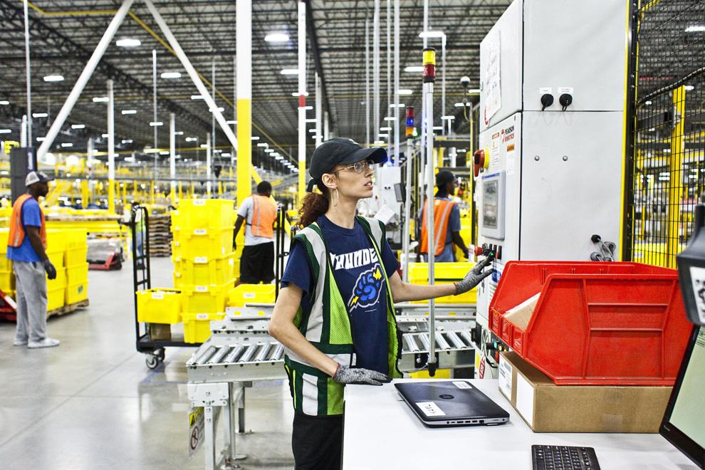As Amazon pushes forward with robots, workers find new roles