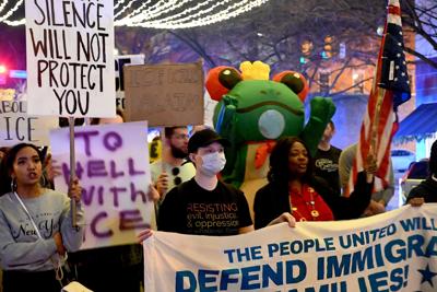 Protestors march Columbia, SC Main Street after ICE shooting