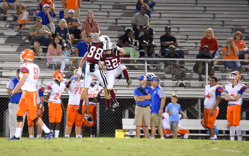 Lewis' 3 touchdowns deliver Wando's first win | Sports | postandcourier.com