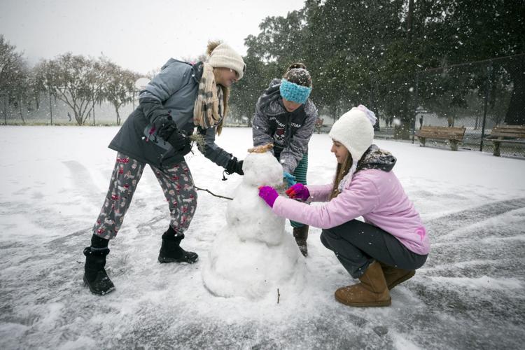 Flurries in Aiken; snow day at the beach as snow and ice come to South ...
