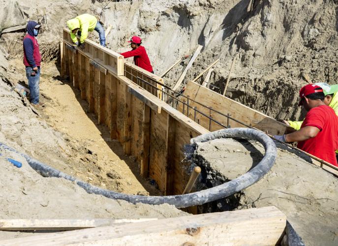 IOP man ignores DHEC, continues to build wall behind home