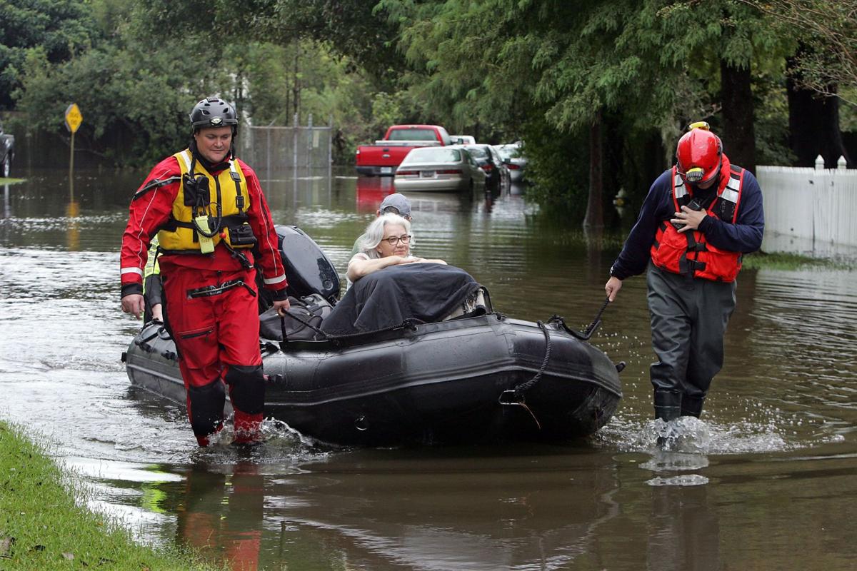 Record flood brings rescues, evacuations Flooding prompts cancellation of events and church ...