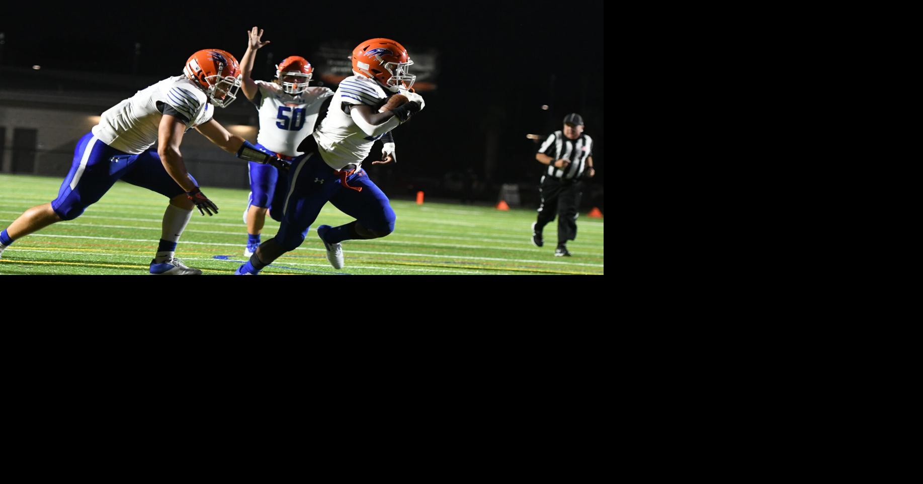 Former Wolves coach wins in Hanahan debut