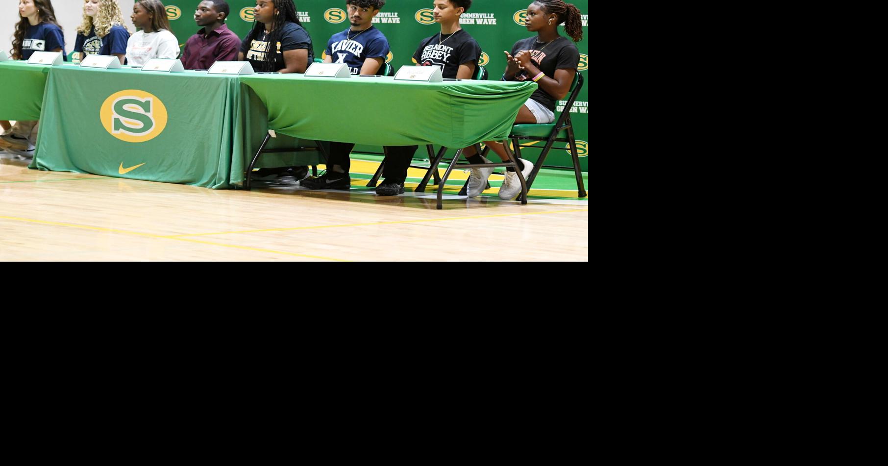 Athletes sign with college programs