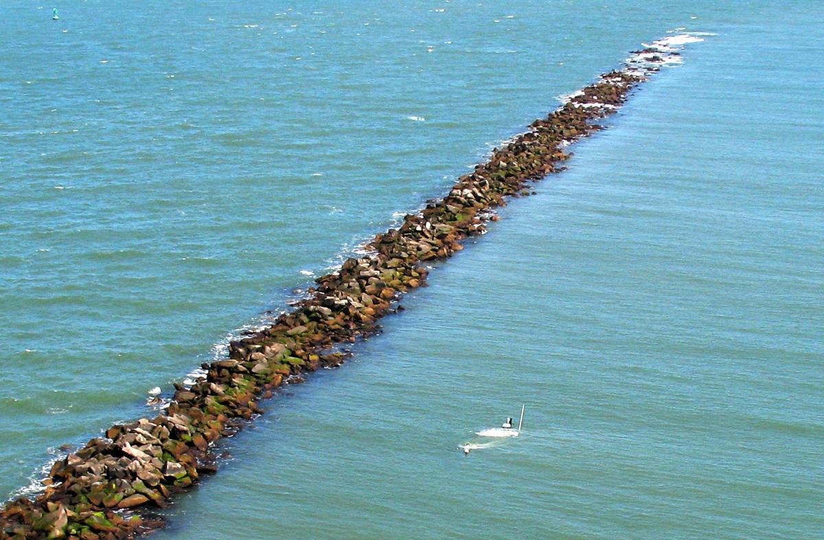 Navy boat that hit jetty recovered