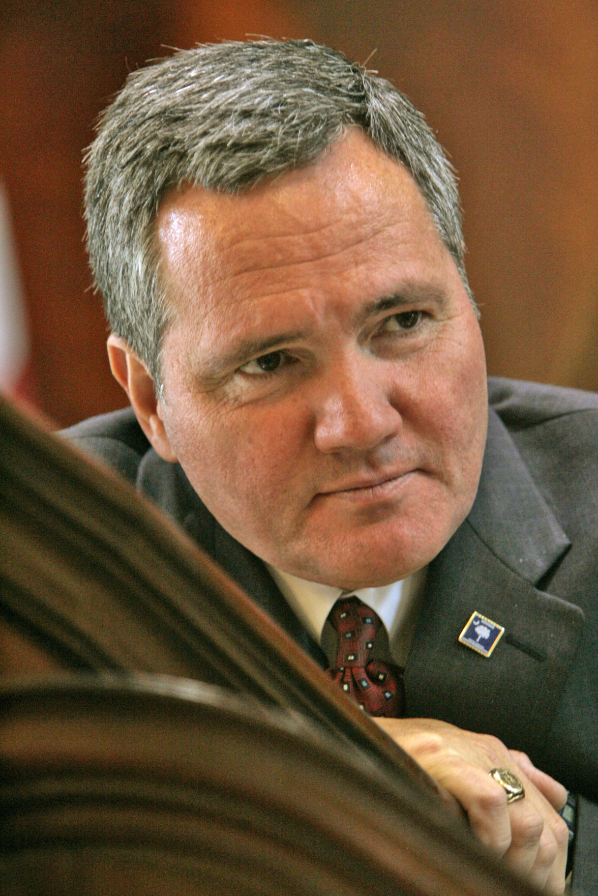 Latham hit with civil suit Bank exec’s wife accuses him of plot ...