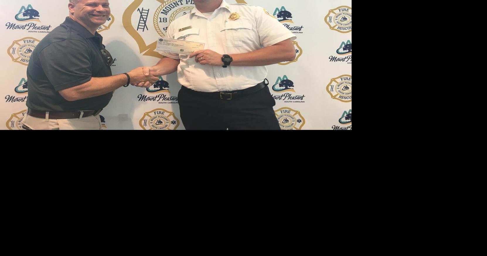 QEI Security & Technology donates $2K to Mount Pleasant Fire Department ...