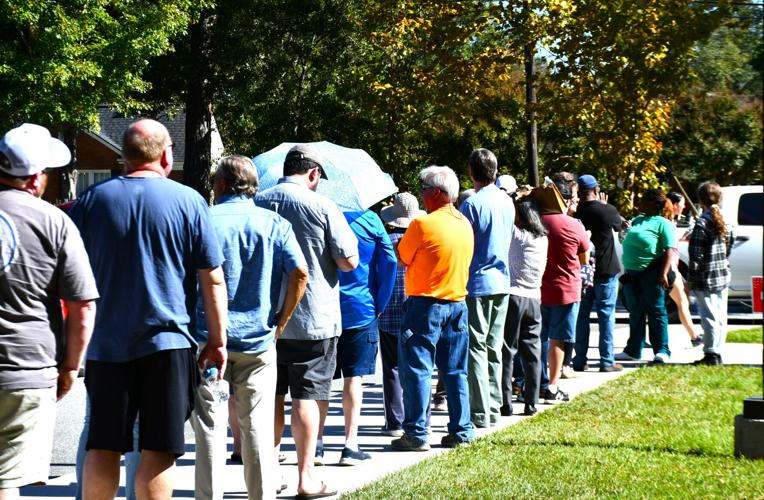 Longs lines, record numbers for early voting