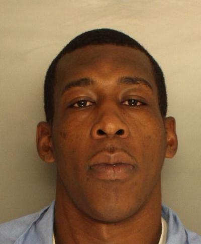 Man with violent past a person of interest in quadruple slaying