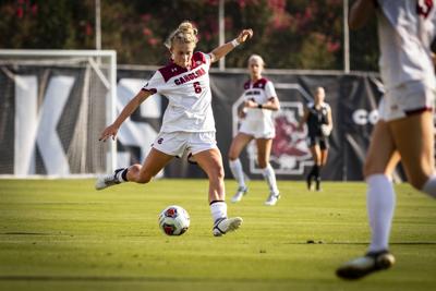 Gamecocks' Dixon plays soccer for school, writes sports for school ...