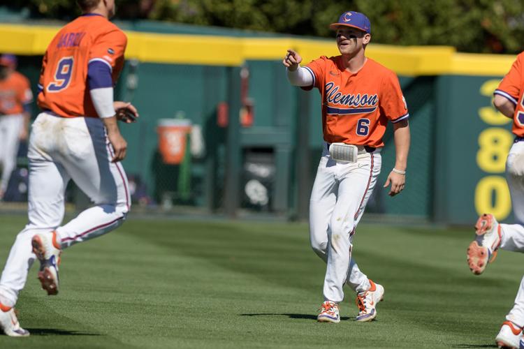 Clemson senior Riley Bertram helps Erik Bakich install his program in ...