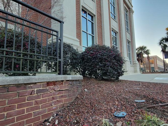Collision damages retaining wall at N.A. Municipal Building