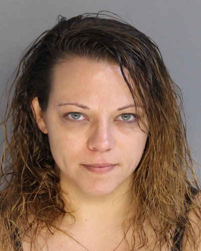 North Augusta woman charged in drive-by shooting, male suspect sought