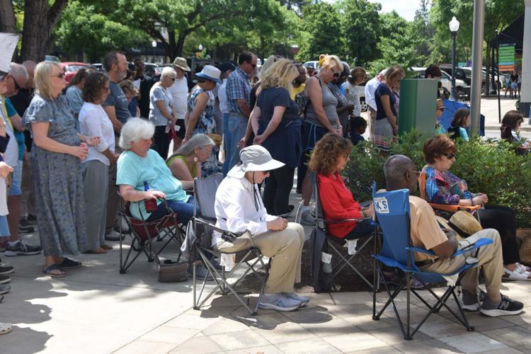 Downtown noon prayer gathering draws dozens