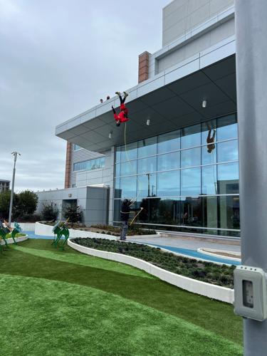 MPPD SWAT Team rappels as superheroes