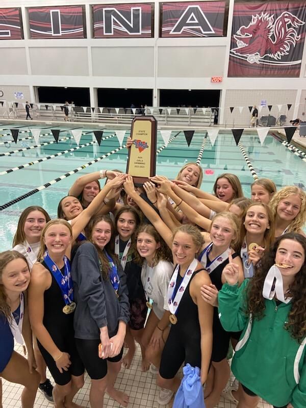 Wando boys, Bishop England girls capture state titles in swimming ...