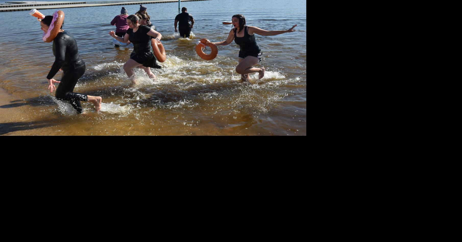 Polar Plunge in Langley Pond draws enthusiastic dippers