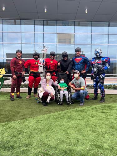 MPPD SWAT Team rappels as superheroes