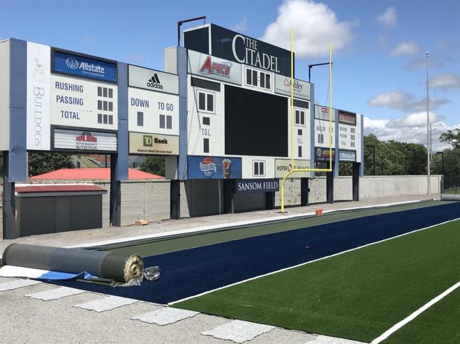 Citadel football's new turf going in stitch by stitch at Johnson Hagood ...