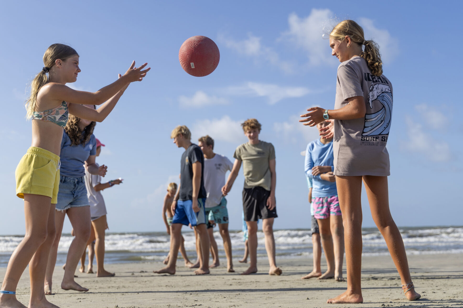 Surfers prepare for the Folly Beach Wahine Classic