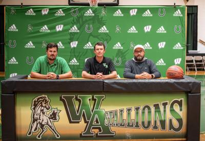 Rowland named WA basketball coach