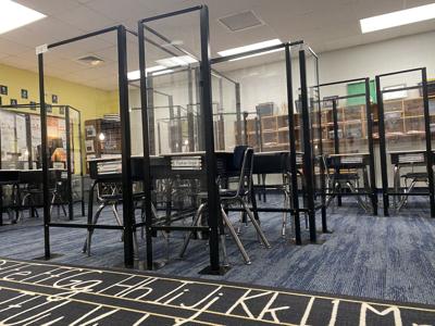 Cubicles for kids: Plexiglass in Aynor Elementary installed, students ...