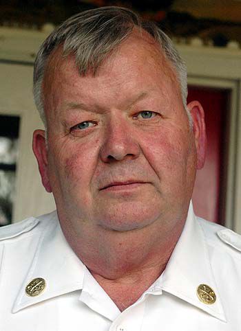 Garvin retires early on request