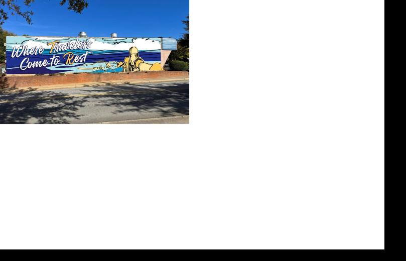 Local artist painting local history and culture into murals in ...