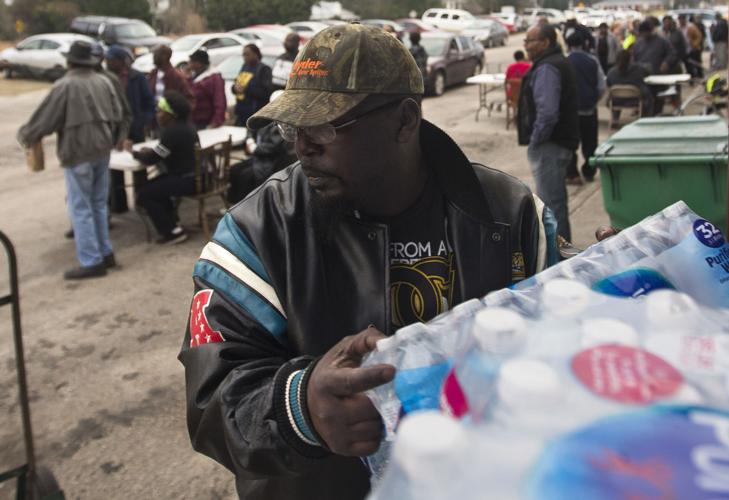Denmark residents lined up for clean drinking water after years of ...