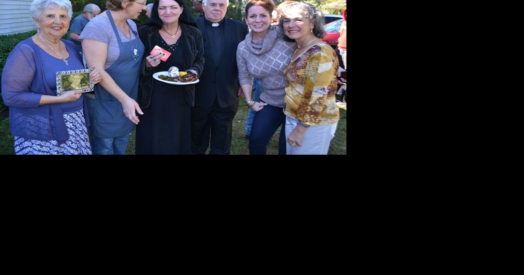 Father Pat serves 100,000th meal