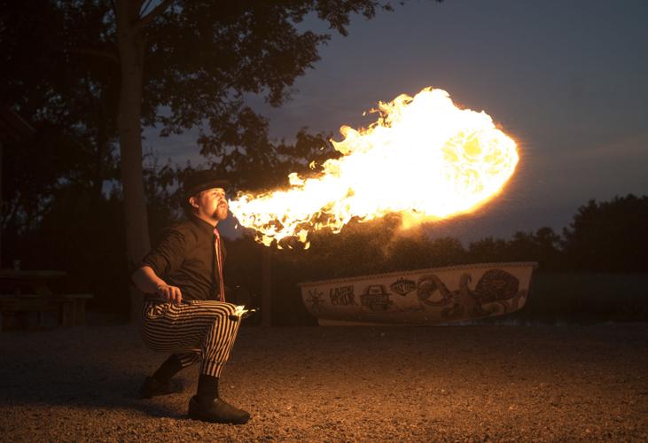 Fire spinners and flow artists in Charleston catching the heatwave
