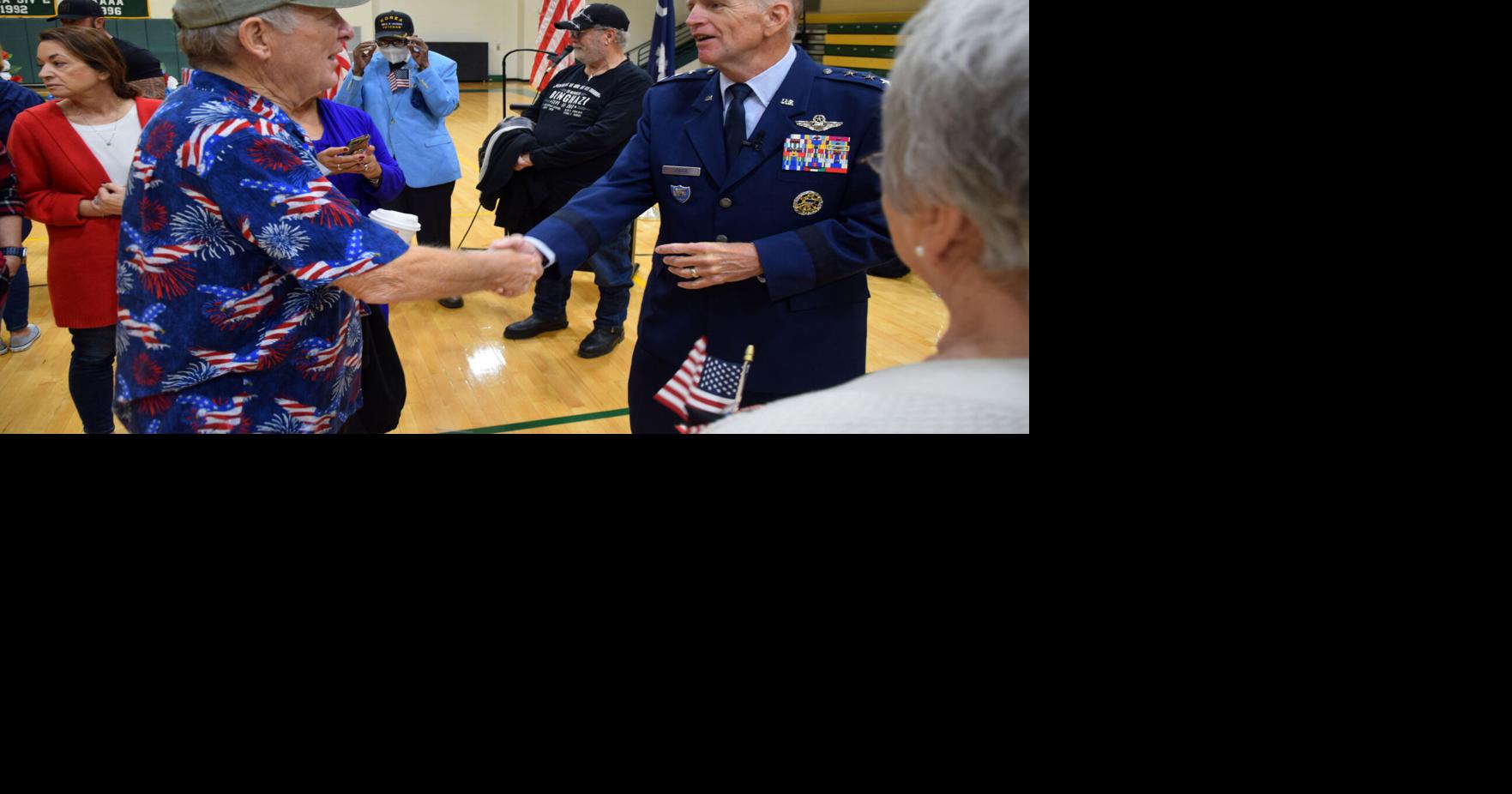 Ceremony salutes veterans, urges 'enough' support