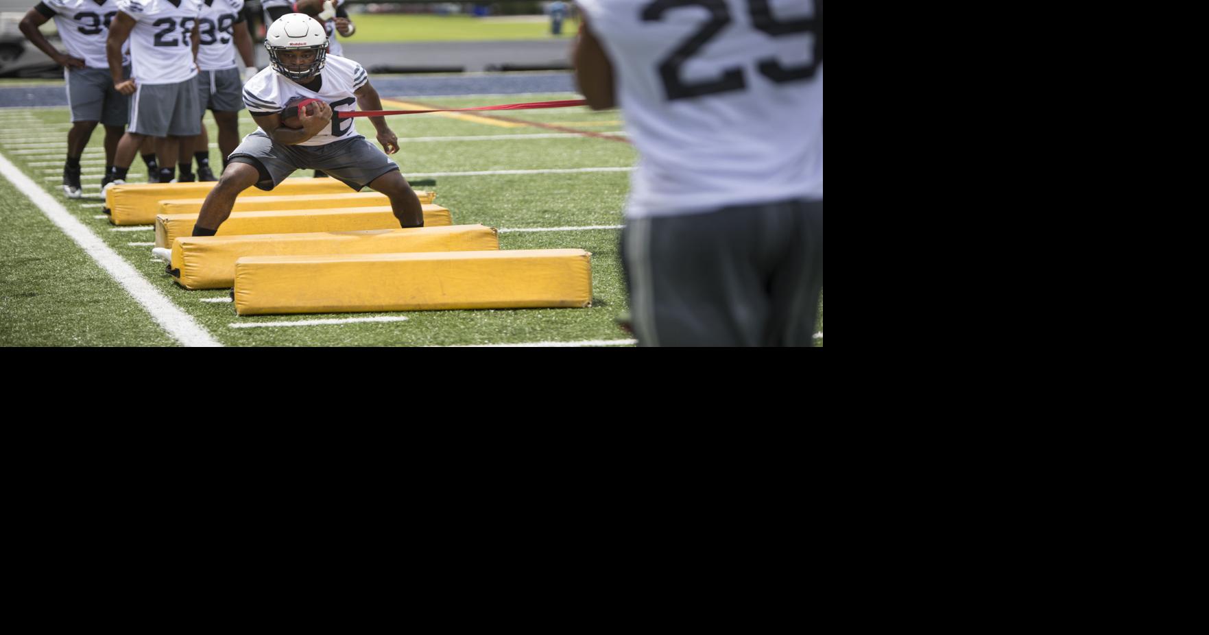 Curated playlists set the rhythm for each part of Citadel football practice