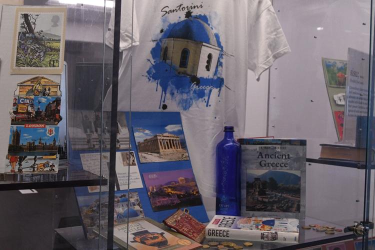 Lifelong traveler creates postcard display at Aiken Library
