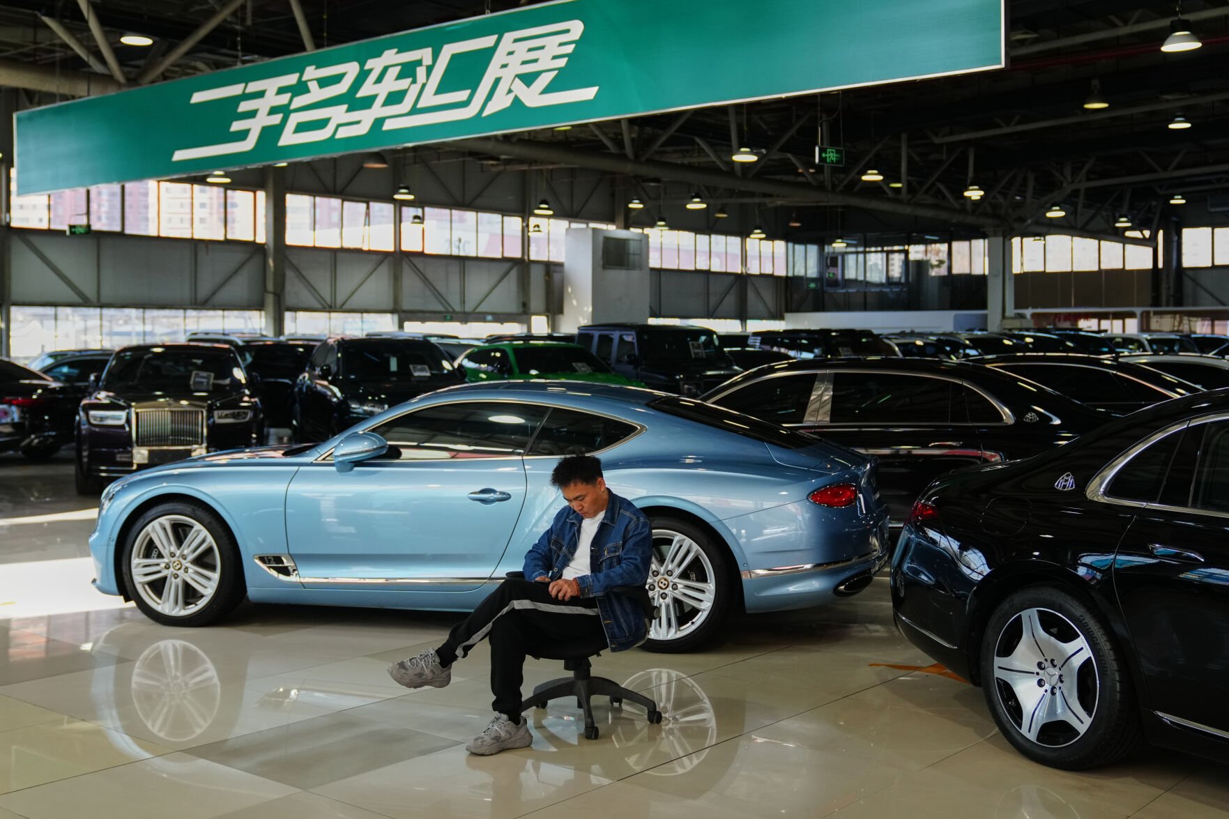 High-end car sales sink in China, taking a toll on BMW and other ...