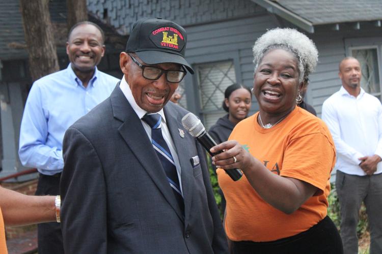 'Quite an honor': Umoja Village unveils sign honoring Richard Johnson Jr.