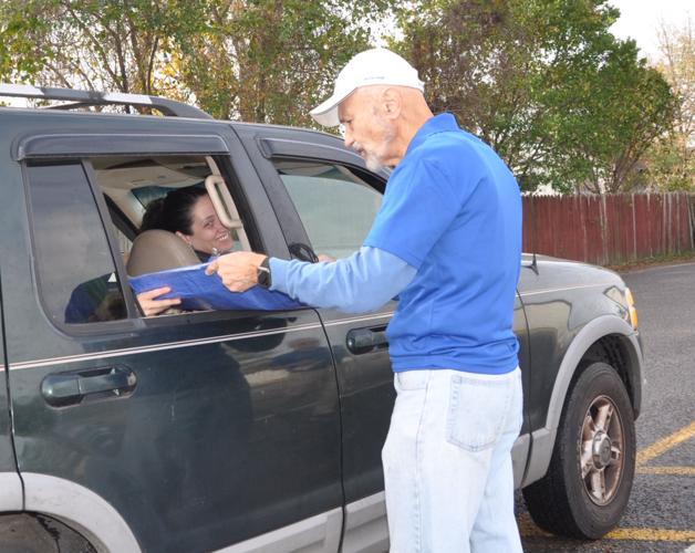 First tarp giveaway event generates enthusiastic response | News ...
