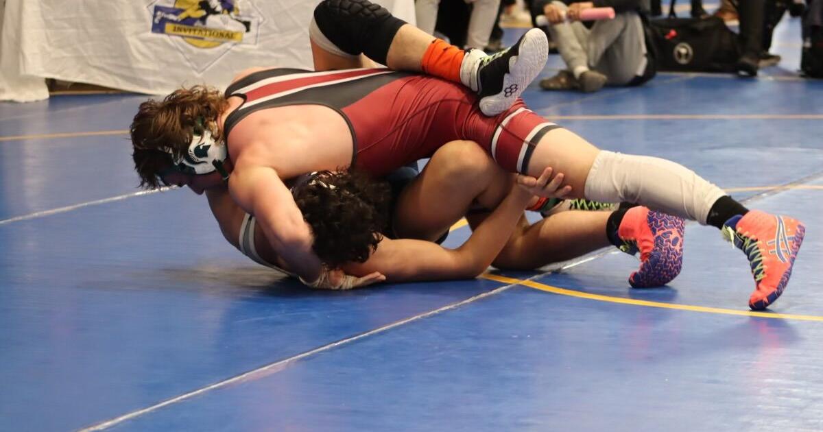 Pinning and winning: Wando wrestler wins 100th match in high school career