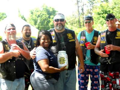 Local motorcycle club gives to Helping Hands