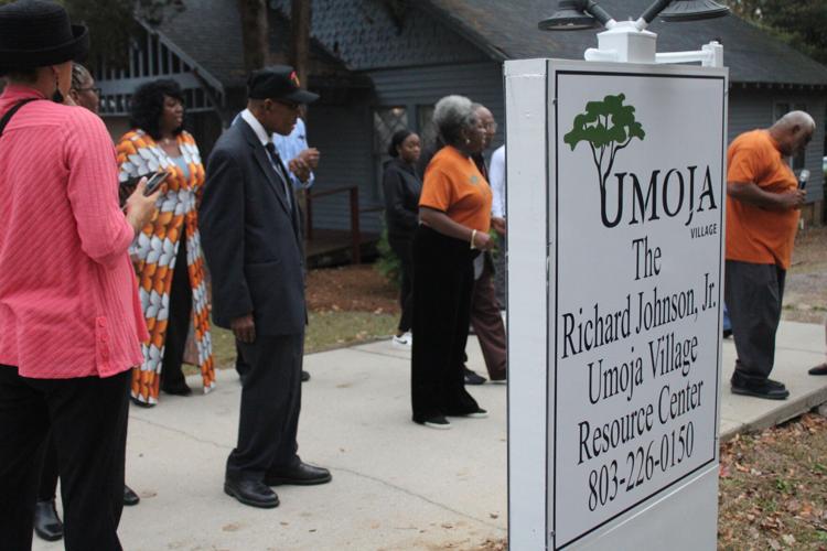 'Quite an honor': Umoja Village unveils sign honoring Richard Johnson Jr.