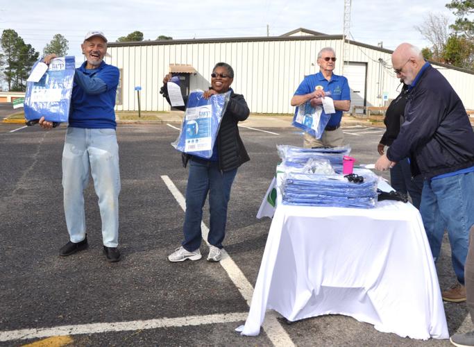 First tarp giveaway event generates enthusiastic response | News ...