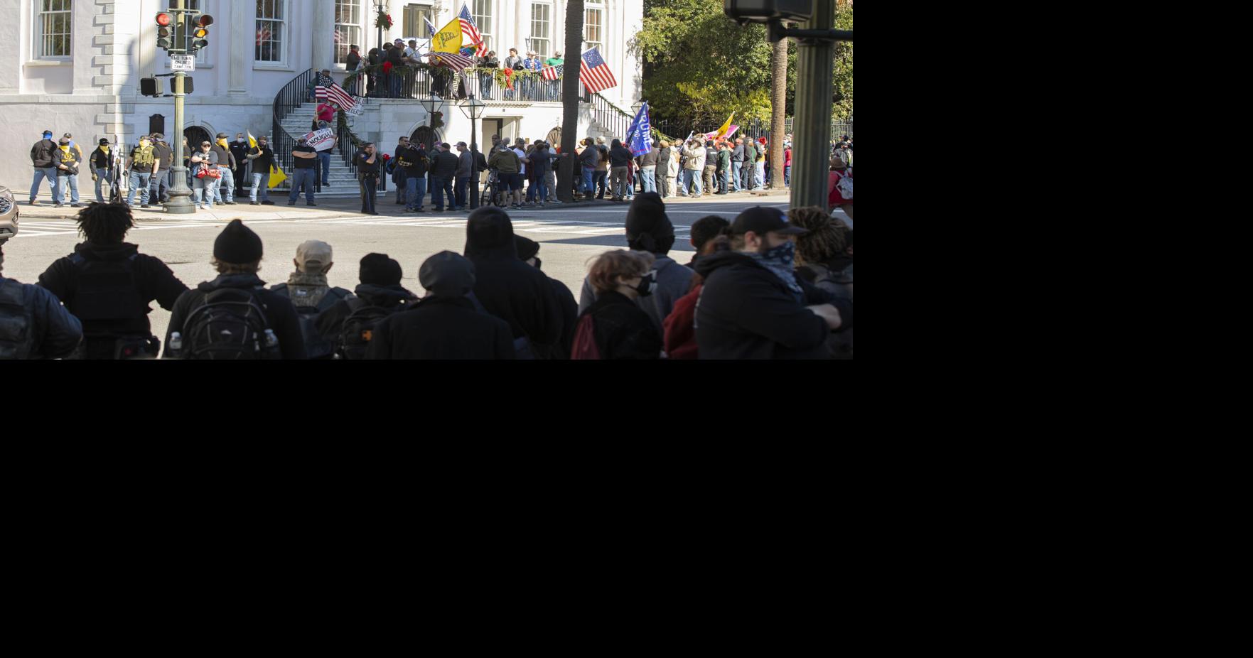 Dueling protests sound off in downtown Charleston, decrying authorities