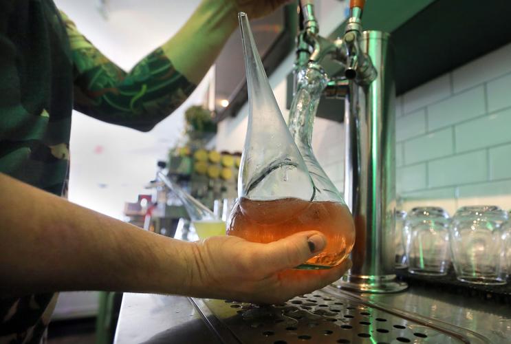 'You have to commit fully to it': How to master the porrón, according ...