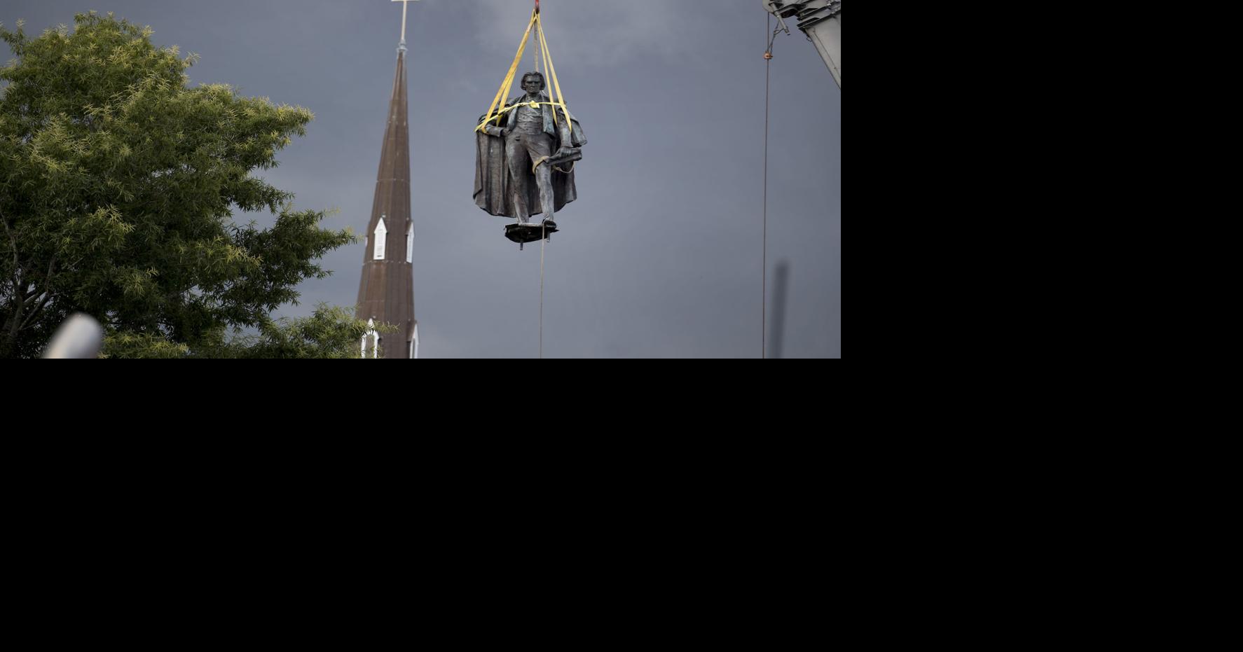 Photos: Removal of Calhoun statue lasts through the night till morning ...